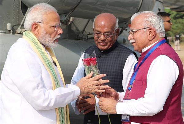 Prime Minister, Mr. Narendra Modi being welcomed by Haryana Governor ...